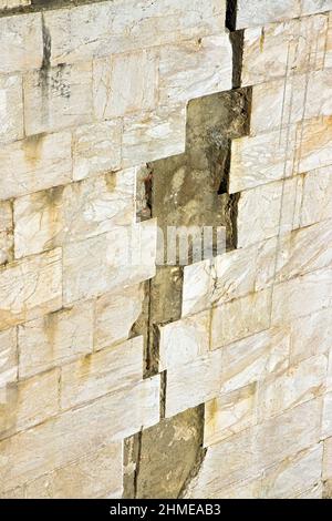 Collapsing wall due to water infiltration, red brick wall deteriorated ...