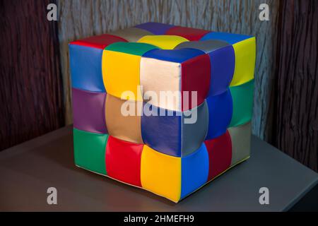 Rubik's cube chair with multicoloured leather squares Stock Photo - Alamy