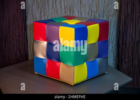 Rubik's cube chair with multicoloured leather squares Stock Photo - Alamy