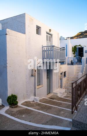 Exterior Cyclades island stone stair between white wall drives to ...