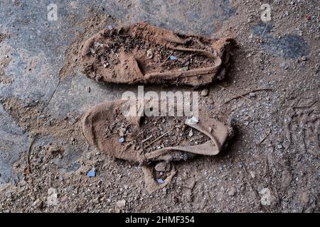 Rotten casual shoes on the floor, rotten shoe, shoe wreck, rotten ...