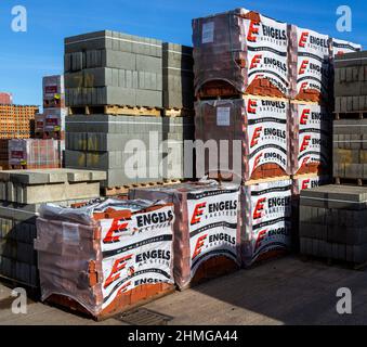 Piles of bricks in Jewson builders merchant yard, Martlesham, Suffolk ...