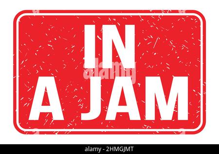 IN A JAM, words written on red stamp sign Stock Photo - Alamy