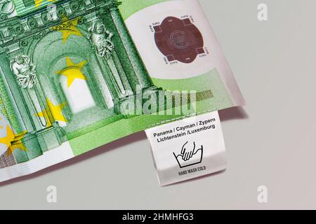 Euro banknote with washing instructions Stock Photo - Alamy