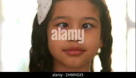 Funny little girl doing crossed eyes Stock Photo - Alamy