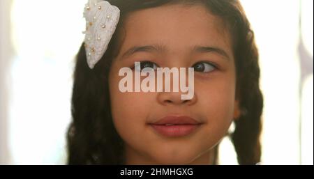 Funny little girl doing crossed eyes Stock Photo - Alamy