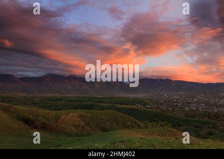 Sunset over the city of Talgar. View from the surrounding hills Stock ...