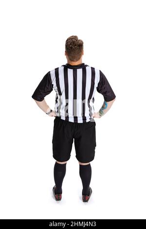 Full length portrait of a football referee with a smartphone with ...