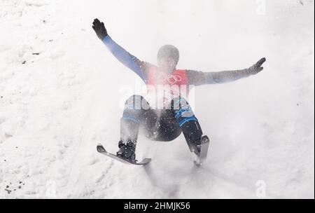 Belarus' Maksim Gustik competes in a World Cup freestyle aerials ...