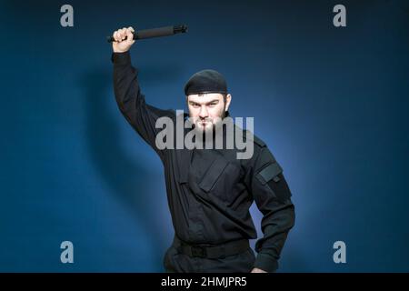 Defender. Mercenary. Bodyguard. Security guard man in black uniform ...