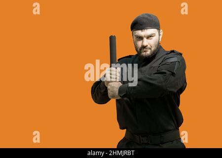 Defender. Mercenary. Bodyguard. Security guard man in black uniform ...