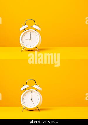 Analog alarm clock showing nine o'clock, 9pm or 9 am isolated on white ...