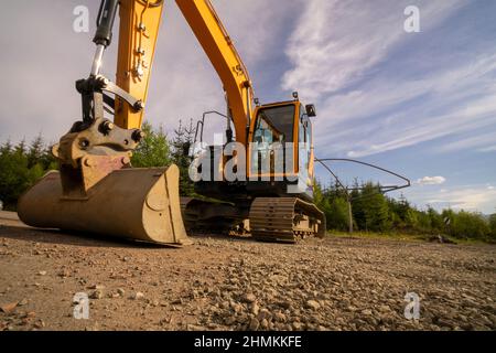 Excavators on caterpillars heavy construction equipment consisting of a ...
