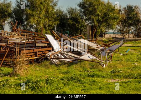 Various scrap items and materials collected for sale as second hand ...