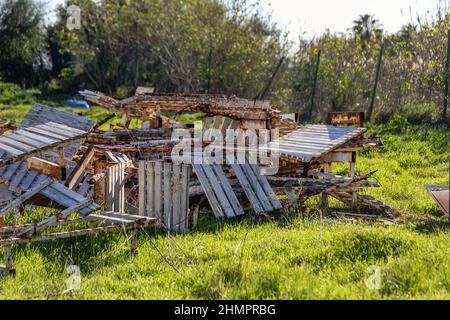 Various scrap items and materials collected for sale as second hand ...