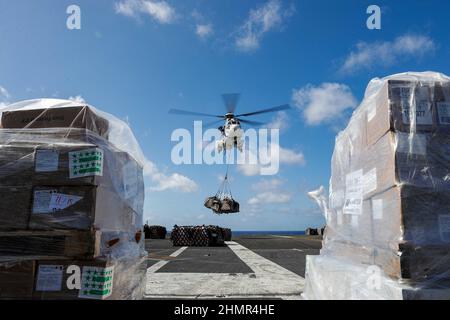PHILIPPINE SEA (Feb. 11, 2022) Logistics Specialist 1st Class Fong Vang ...