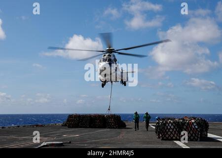 PHILIPPINE SEA (Feb. 11, 2022) Logistics Specialist 1st Class Fong Vang ...