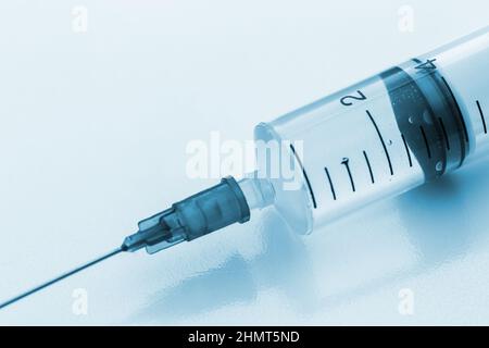 medical syringe close-up on a white isolated background Stock Photo - Alamy