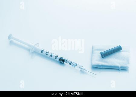 disposable syringe with cannula for injection wadding pad Stock Photo ...