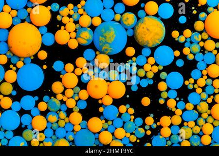 Acrylic paint balls abstract texture. Bright colors fluid, flowing ...