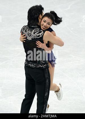 Shiyue WANG & Xinyu LIU, China, during practice, at the ISU Grand Prix ...