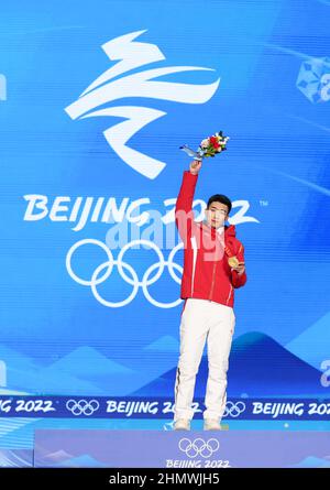 Gold medalist Gao Tingyu of China, center, celebrates during a venue ...