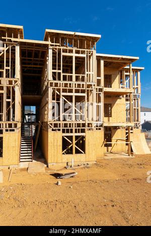 A vertical shot of a residential building under clear sky Stock Photo ...