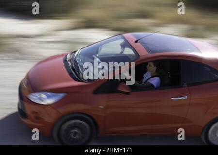 Photo of a little red Ford Ka car in the desert Stock Photo - Alamy
