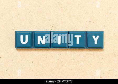 Alphabet letter in word unity on wood background Stock Photo - Alamy