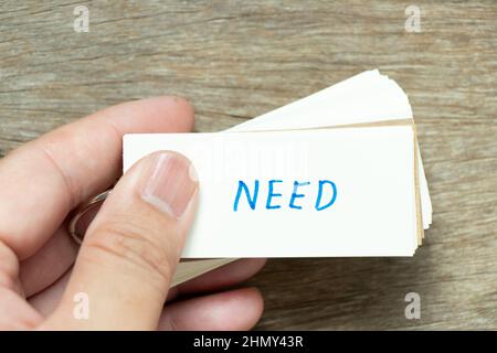 Man hold the flash card with handwriting word PDCA (Abbreviation of ...