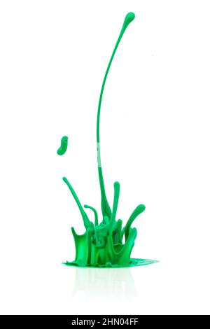 green paint splashing isolated on white Stock Photo - Alamy