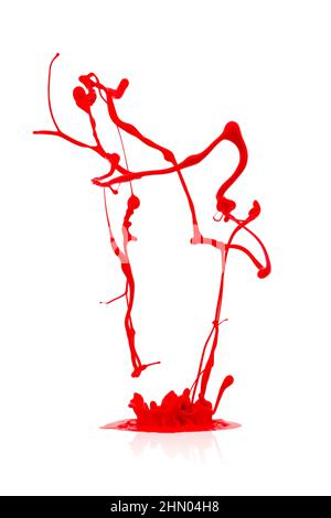 Red paint splash on a white paper Stock Photo - Alamy