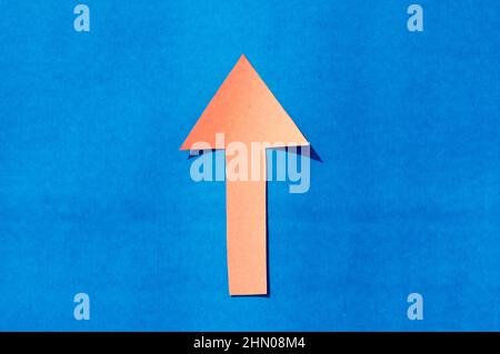 A up facing arrow symbol indicating upward direction. Isolated on blue ...