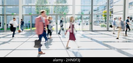 Few anonymous people go and wait in Halle Stock Photo - Alamy