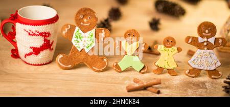 gingerbread men on the wooden floor with Christmas decorations Stock ...