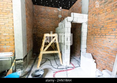 Newly renovated generic empty office space with leftover materials and ...