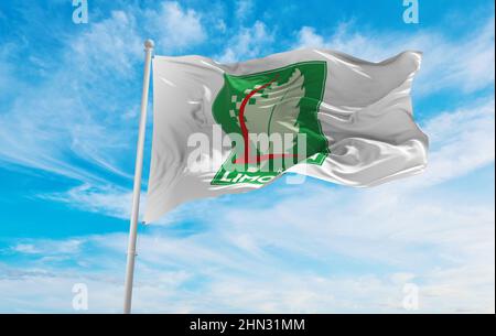 flag of Limousin, France at cloudy sky background on sunset, panoramic ...