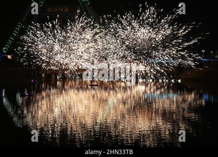 HANDAN, CHINA - FEBRUARY 13, 2022 - Folk artists perform "beating iron ...