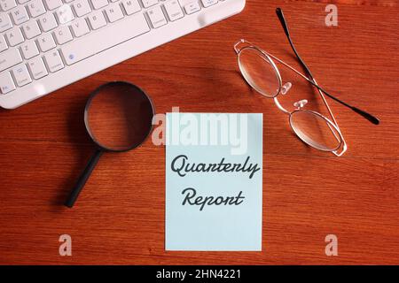 Magnifying glass, graph paper and keyboard on the table Stock Photo - Alamy