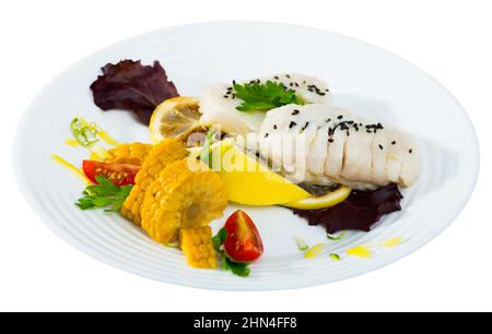 Recipe for steamed hake with vegetables Stock Photo - Alamy