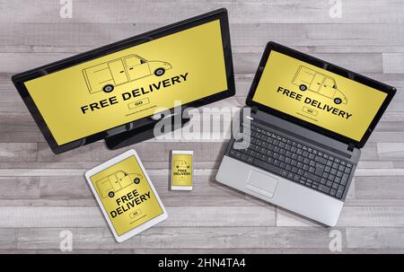 Free delivery concept shown on different information technology devices ...