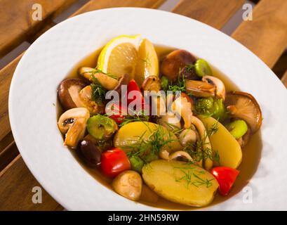 Pottage in country style of mushrooms with vegetables Stock Photo - Alamy