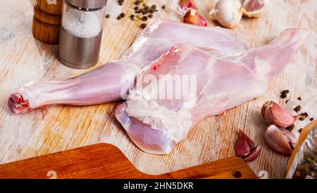 Close up of raw shoulder of goat on wooden surface, nobody Stock Photo ...