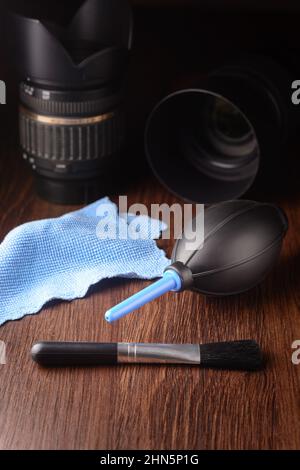 Cleaning kit for camera lenses on a white background, photographer ...