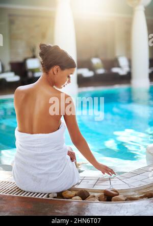 Today is for being pampered. a beautiful young woman at the beauty spa ...