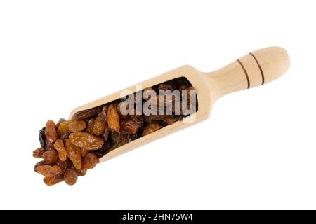 royal raisins in wooden scoop isolated on white background. Spice and ...