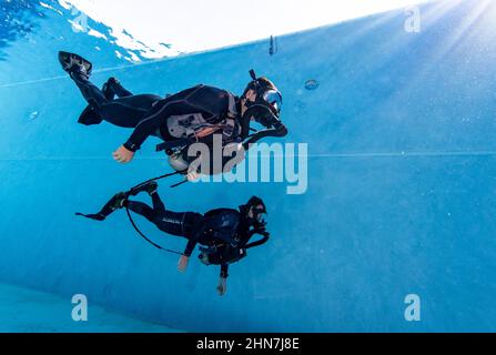SAN DIEGO – Navy Divers assigned to a West Coast Naval Special Warfare ...