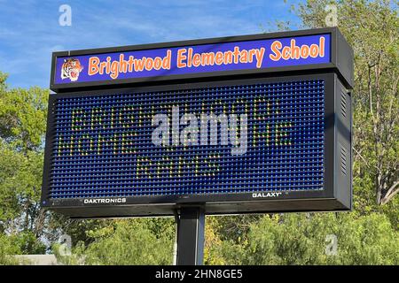 The Brightwood Elementary School marquee sign reads "Sorry, not sorry ...