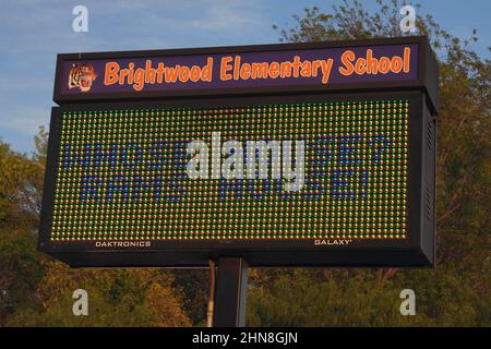 The Brightwood Elementary School marquee sign reads "Whose School? Rams ...