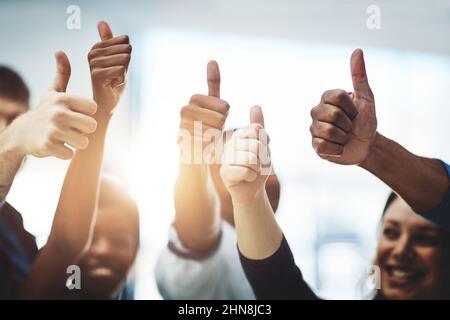Bravo on your business accomplishment. Cropped shot of a team of ...